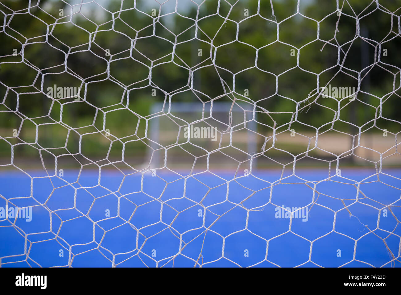 Goal net with blurred of futsal court background Stock Photo - Alamy