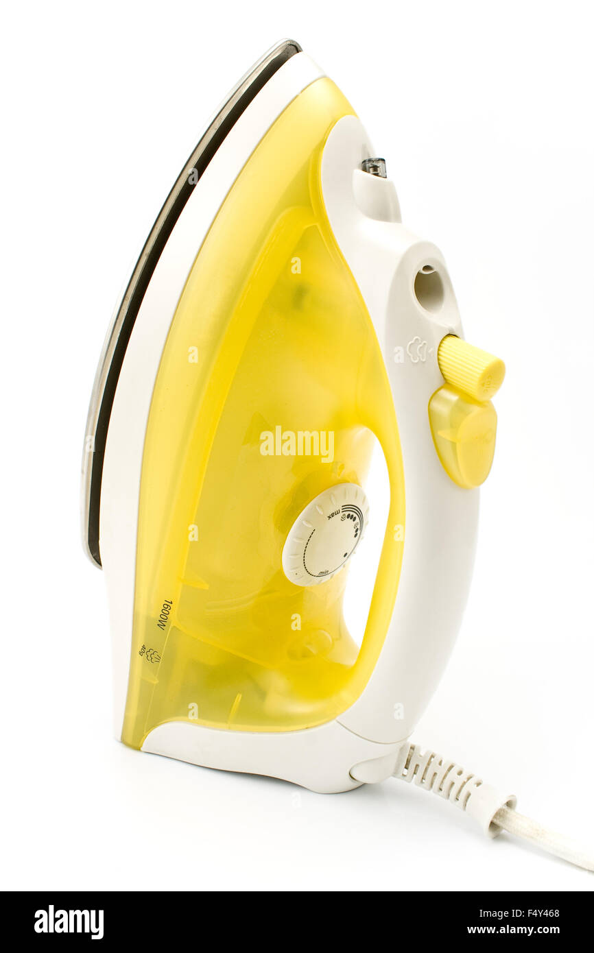Yellow electric iron isolated on white Stock Photo - Alamy