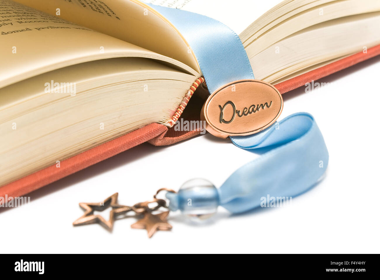 Bookmark in a book isolated on white Stock Photo - Alamy