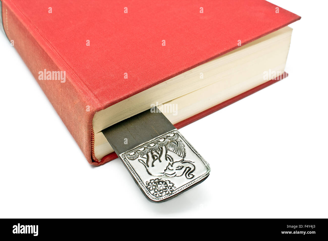 Bookmark in a book isolated on white Stock Photo - Alamy