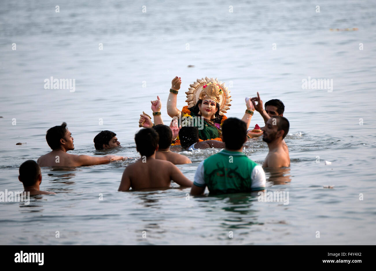 The image of Durga Idol immersion was taken in Mumbai Chowpatty, India ...