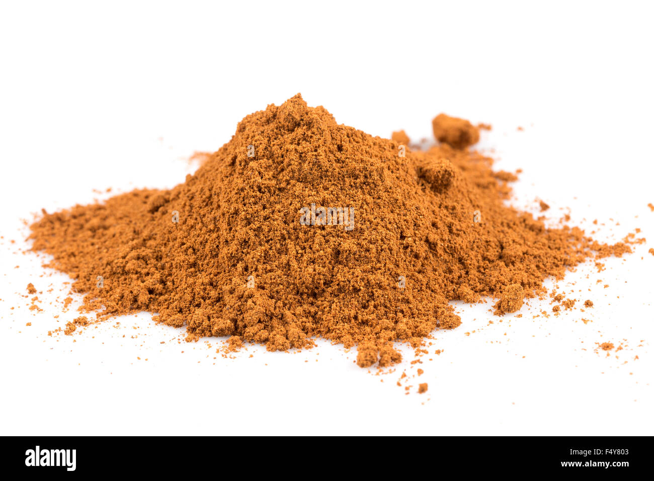 cinnamon powder isolated on a white background Stock Photo - Alamy