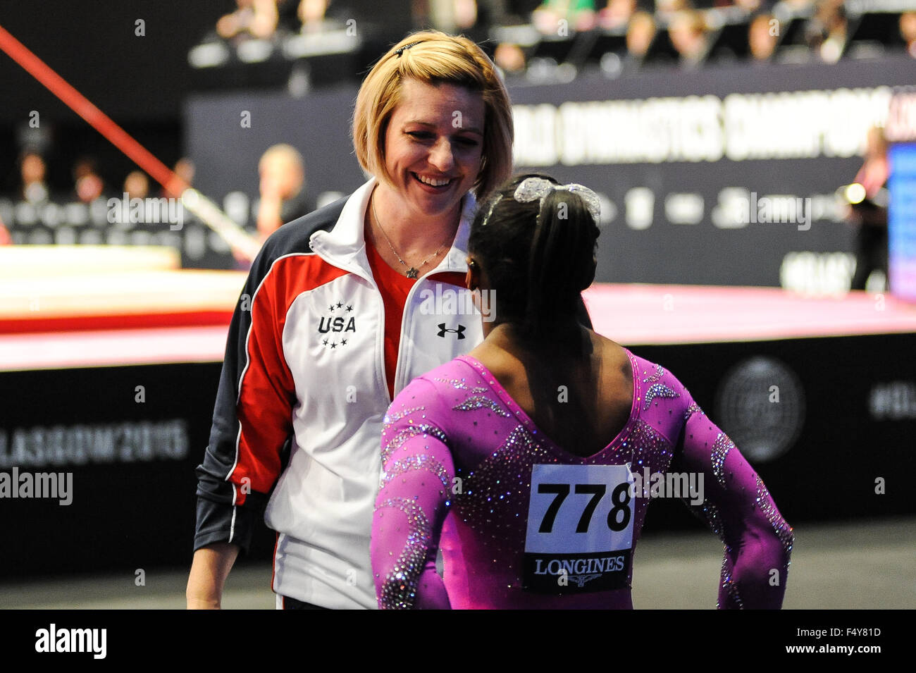 Glasgow, UK. 24th Oct, 2015. SIMONE BILES and her coach share a moment ...