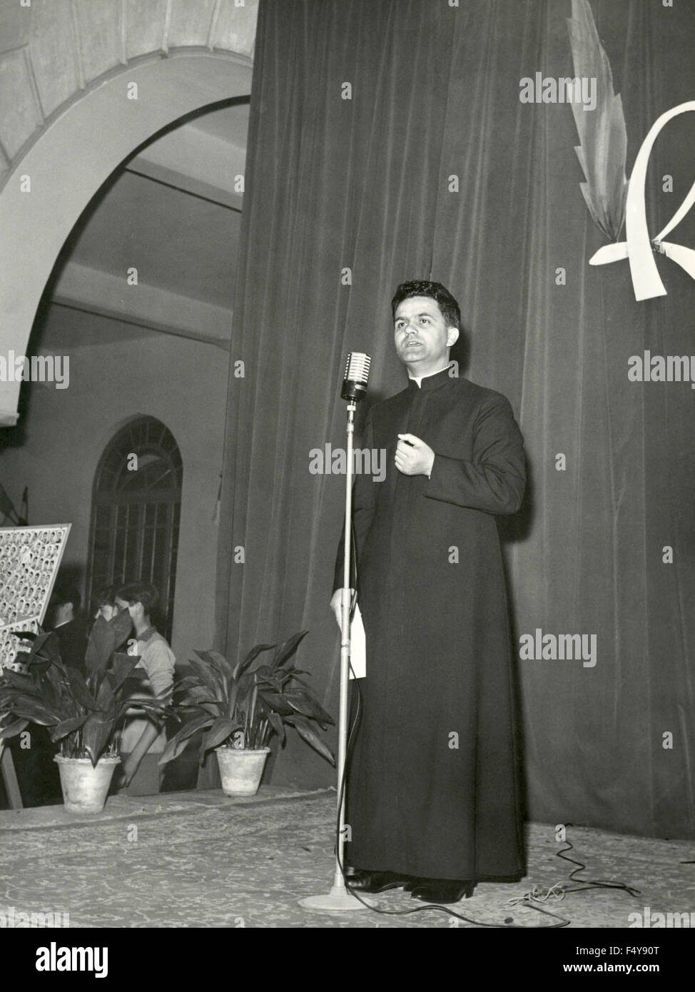 A Catholic priest presents a show, Italy Stock Photo - Alamy