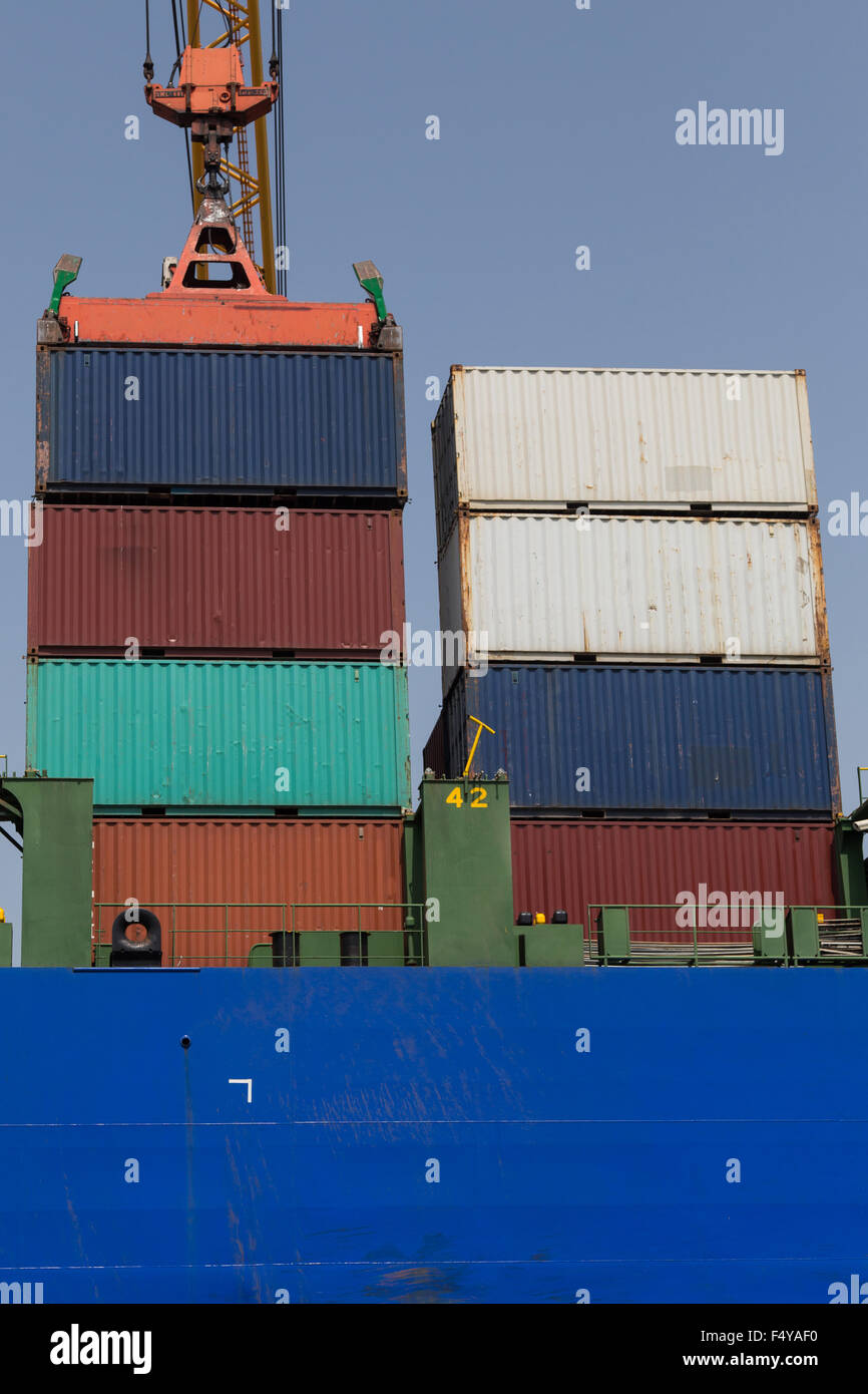 Container Ship is loading in a port Stock Photo - Alamy