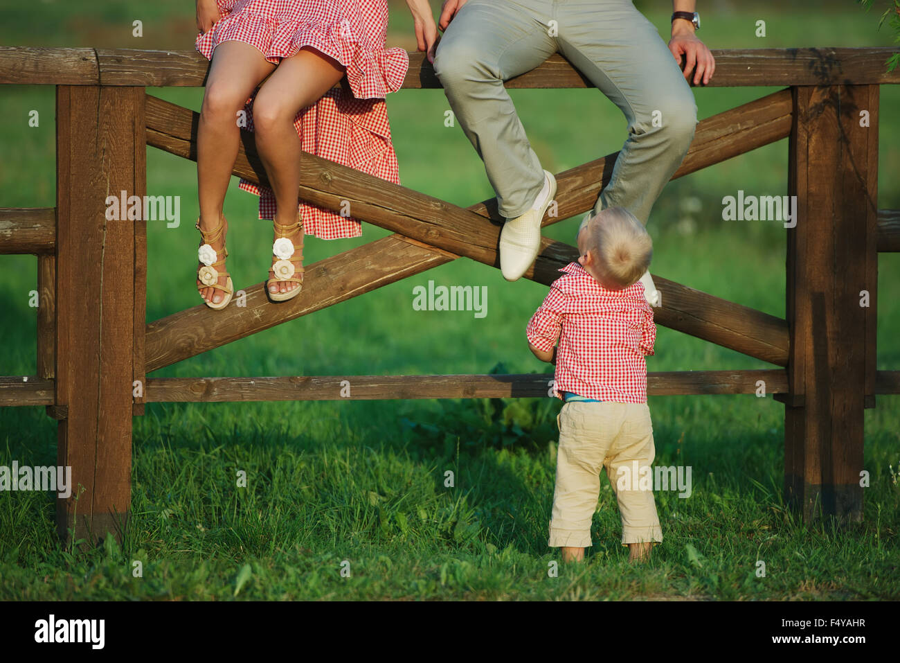 little boy with parents outdoors Stock Photo - Alamy