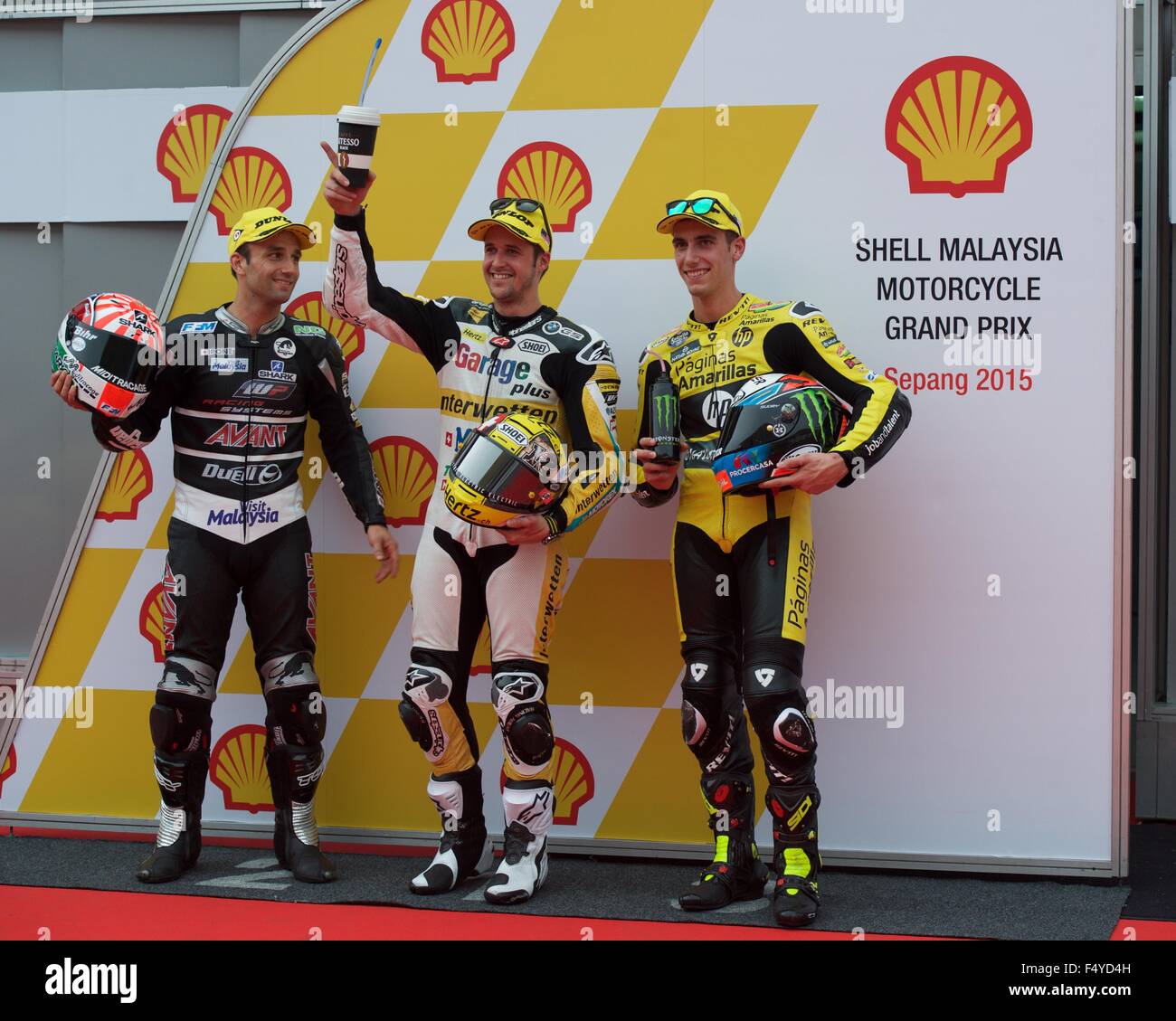 Sepang Circuit, Malaysia. 24th Oct, 2015. The front row riders ...