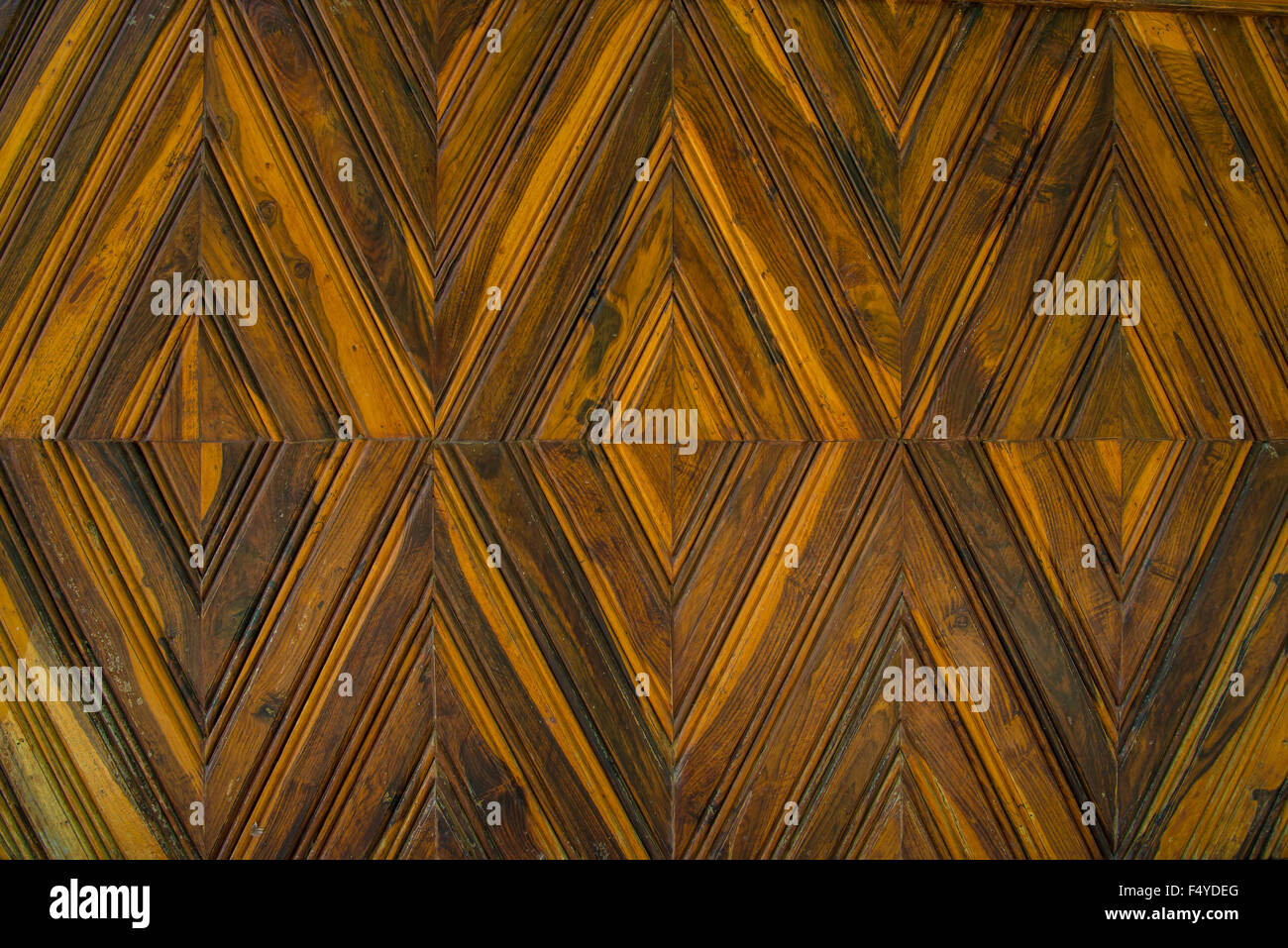 Pattern squares on a wooden wall, Background Stock Photo - Alamy