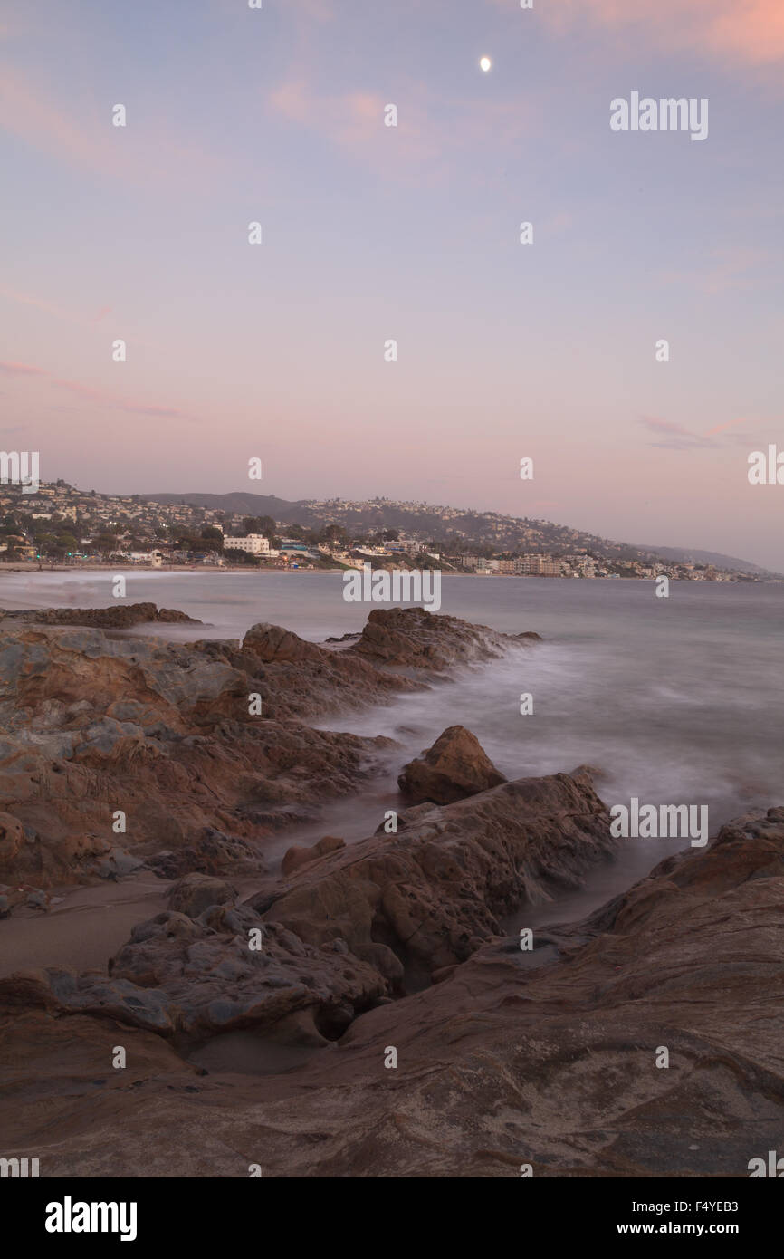 Long exposure of rocks in waves, giving a mist like effect over ocean ...