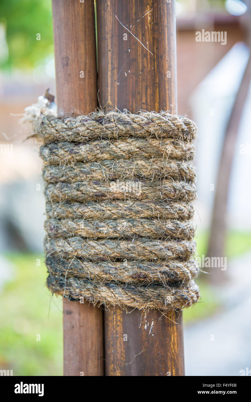 Hemp rope wrapped around the rods to seized the rods to the pole Stock ...