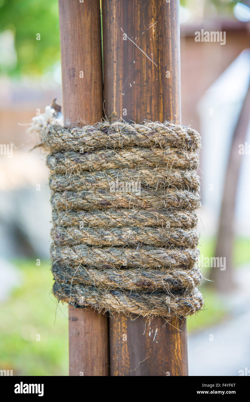 Hemp rope wrapped around the rods to seized the rods to the pole Stock ...