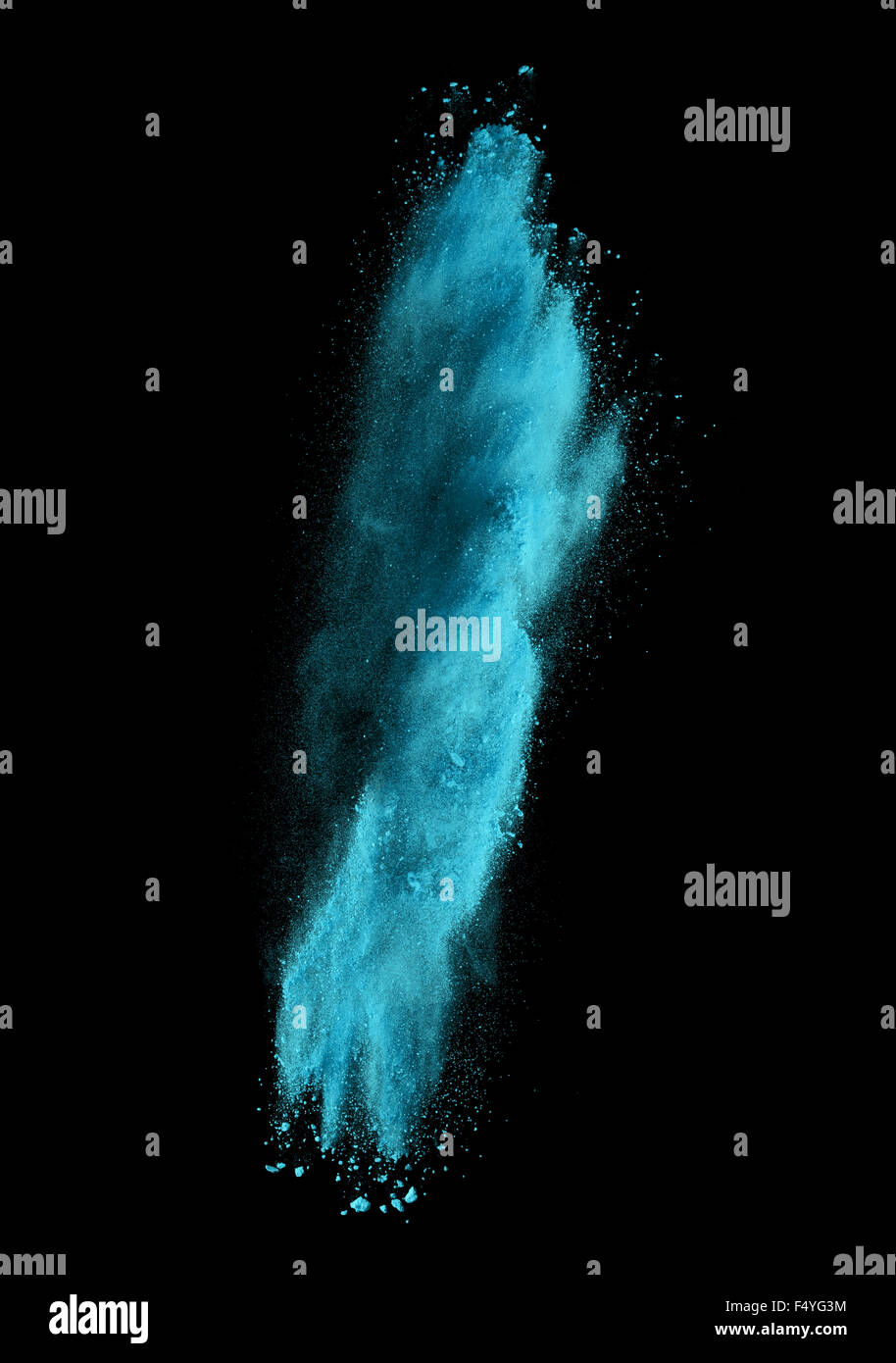 Freeze motion of blue dust explosion isolated on black backgroun Stock ...
