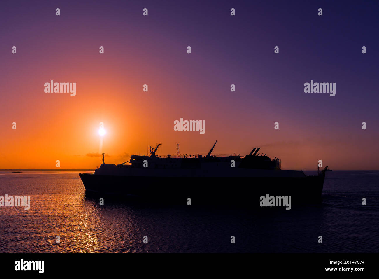 Ferry cruising into the Caribbean sunset Trinidad and Tobago Stock ...