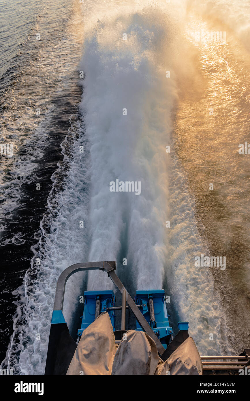 Ferry engine spray sunset time powerful engines Stock Photo - Alamy