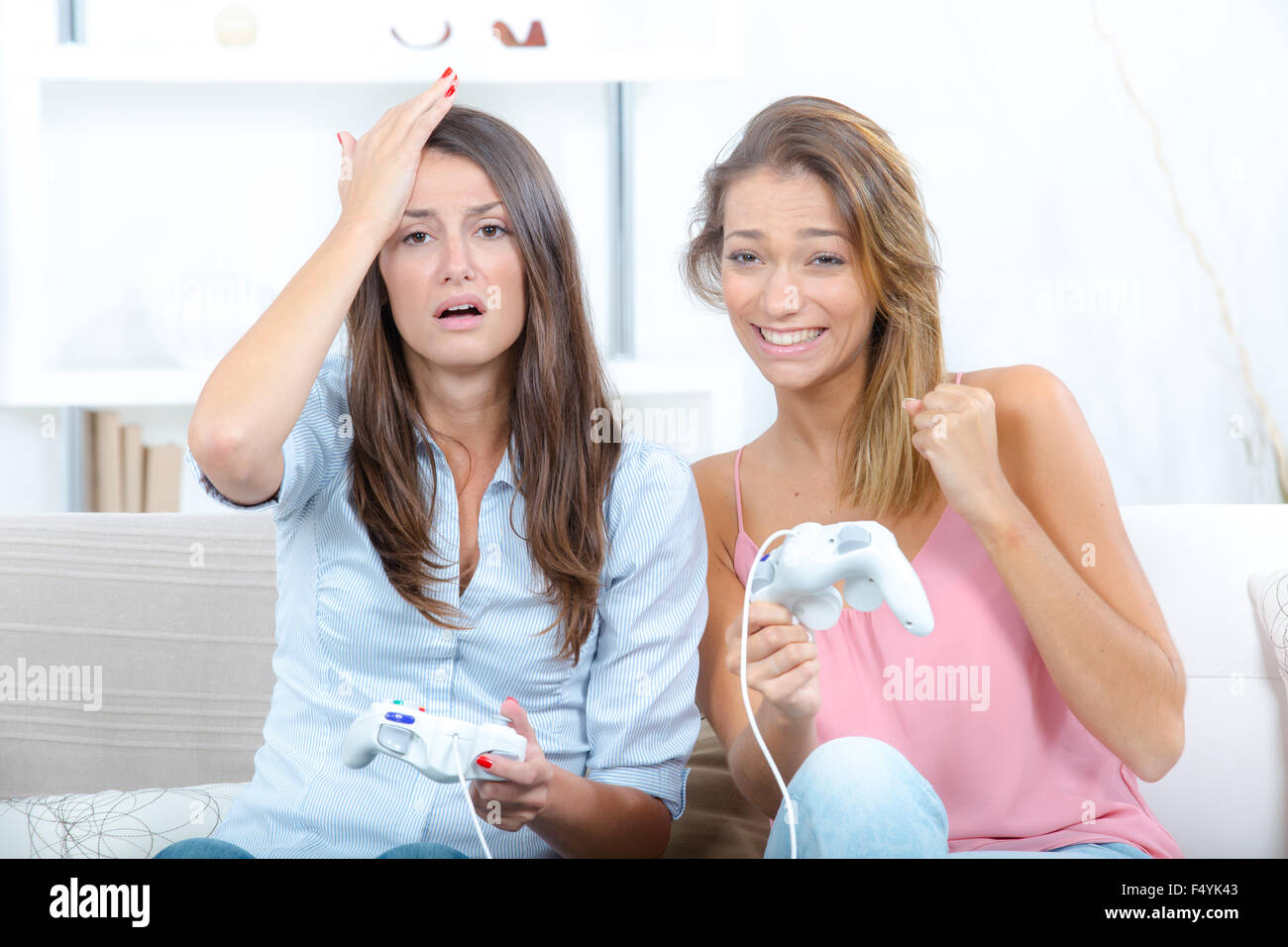 Ladies playing computer game Stock Photo - Alamy