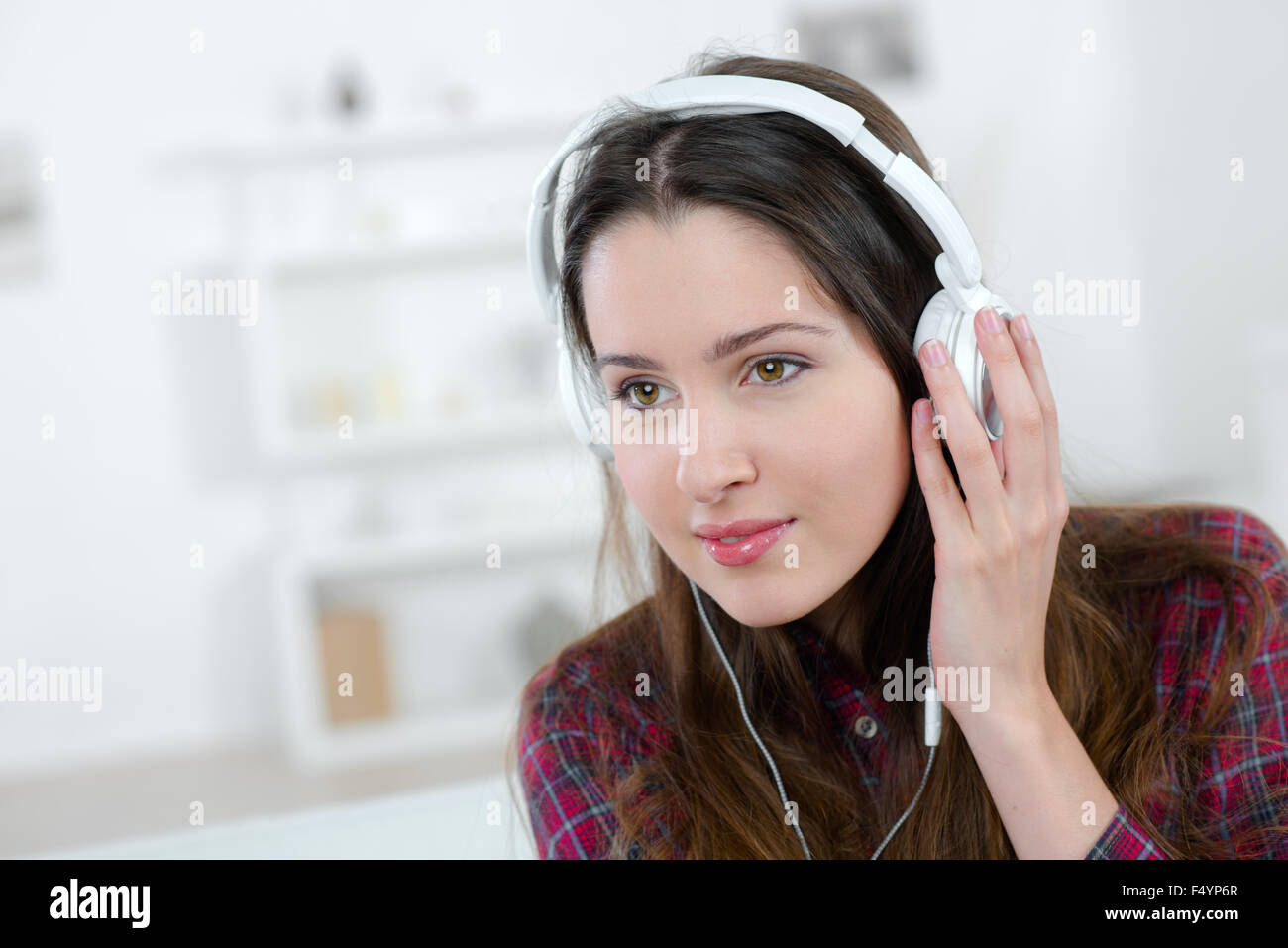 Teenage girl listening to music Stock Photo - Alamy