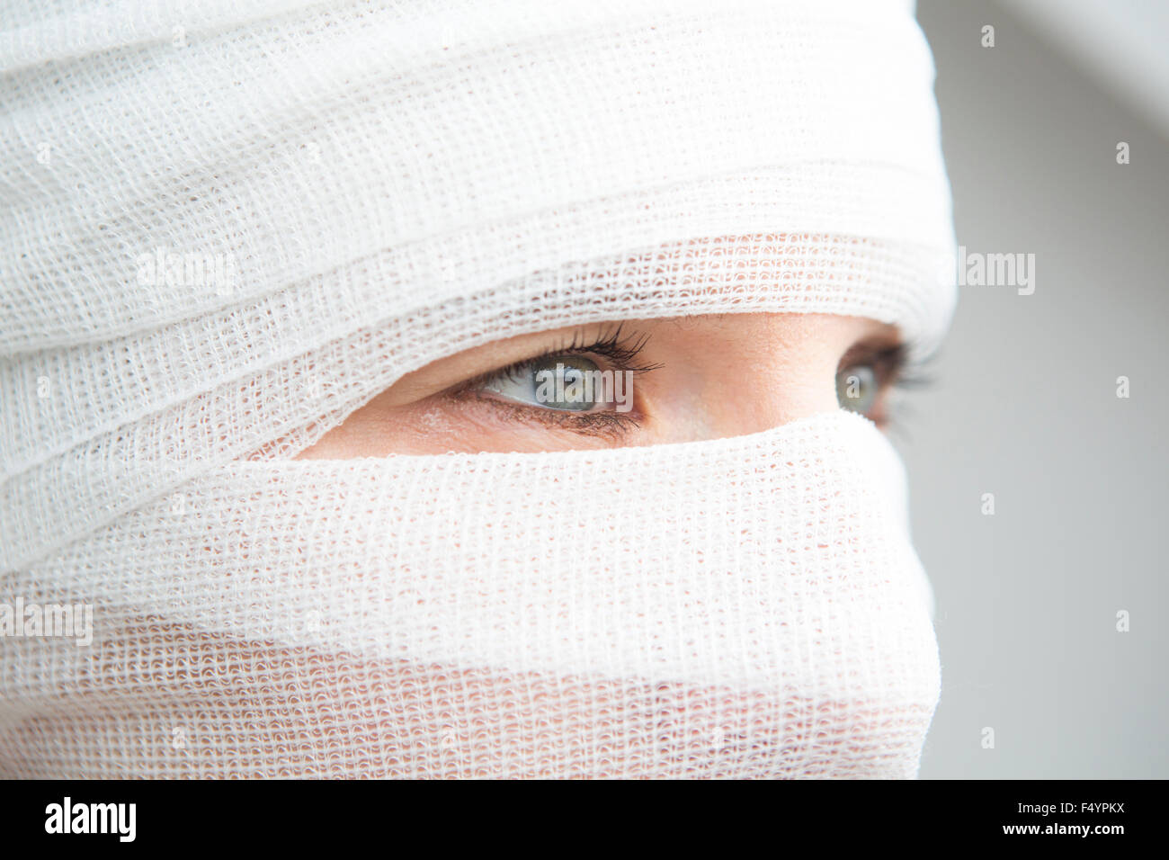 closeup of woman wrapped in bandages with beautiful eyes Stock Photo ...