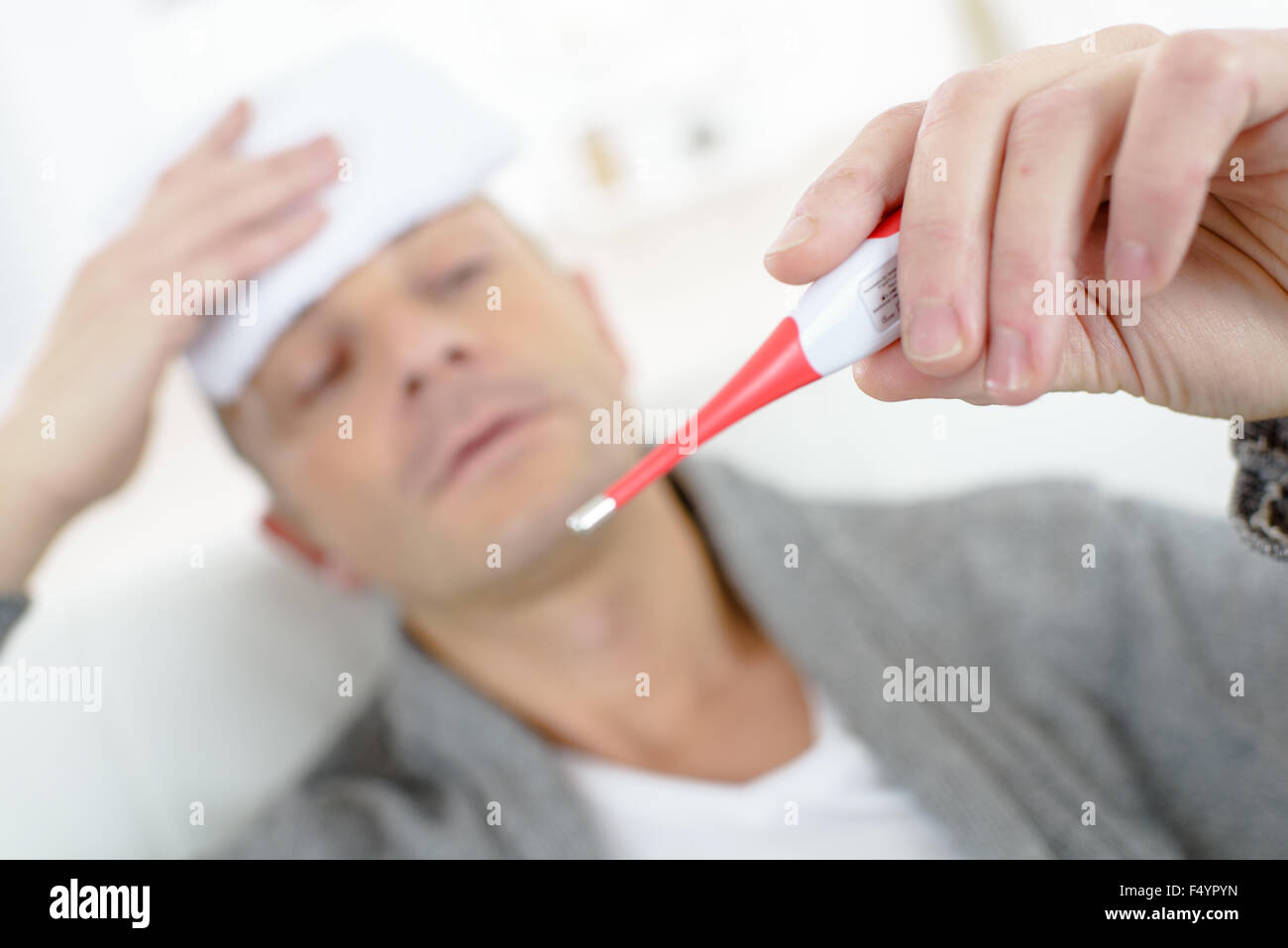 Man running a fever Stock Photo - Alamy