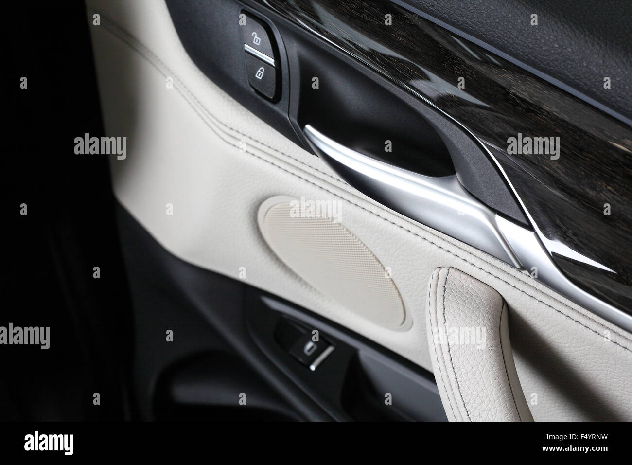 Interior of leather passenger compartment of the car in light tones ...