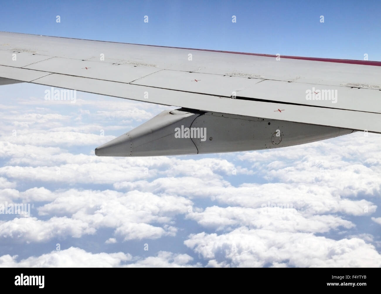 Aerial view of jet plane wing and clouds Stock Photo - Alamy