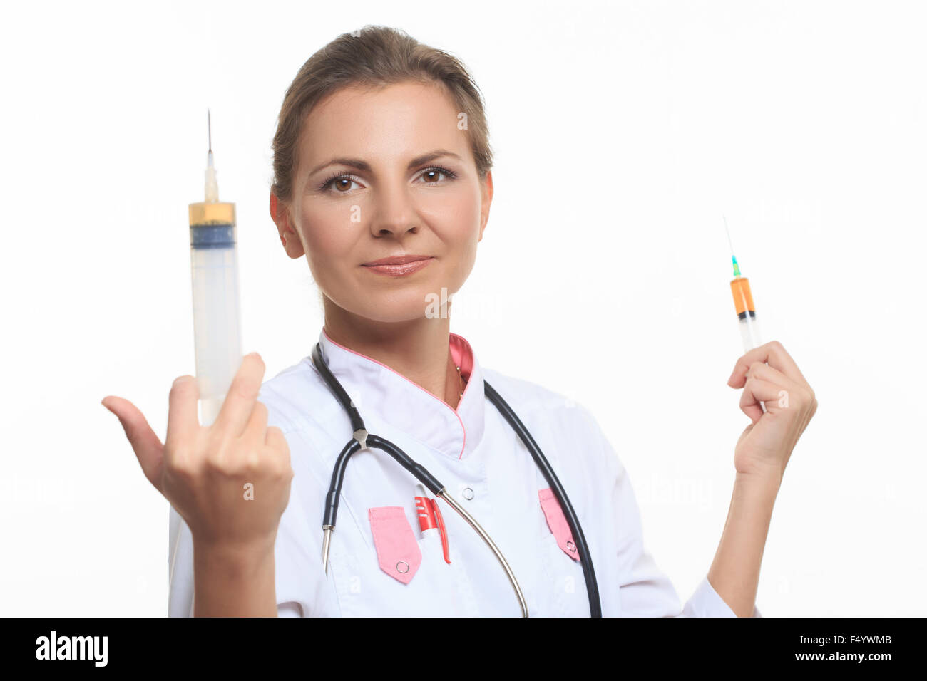 Blonde nurse holding syringe hi-res stock photography and images - Alamy