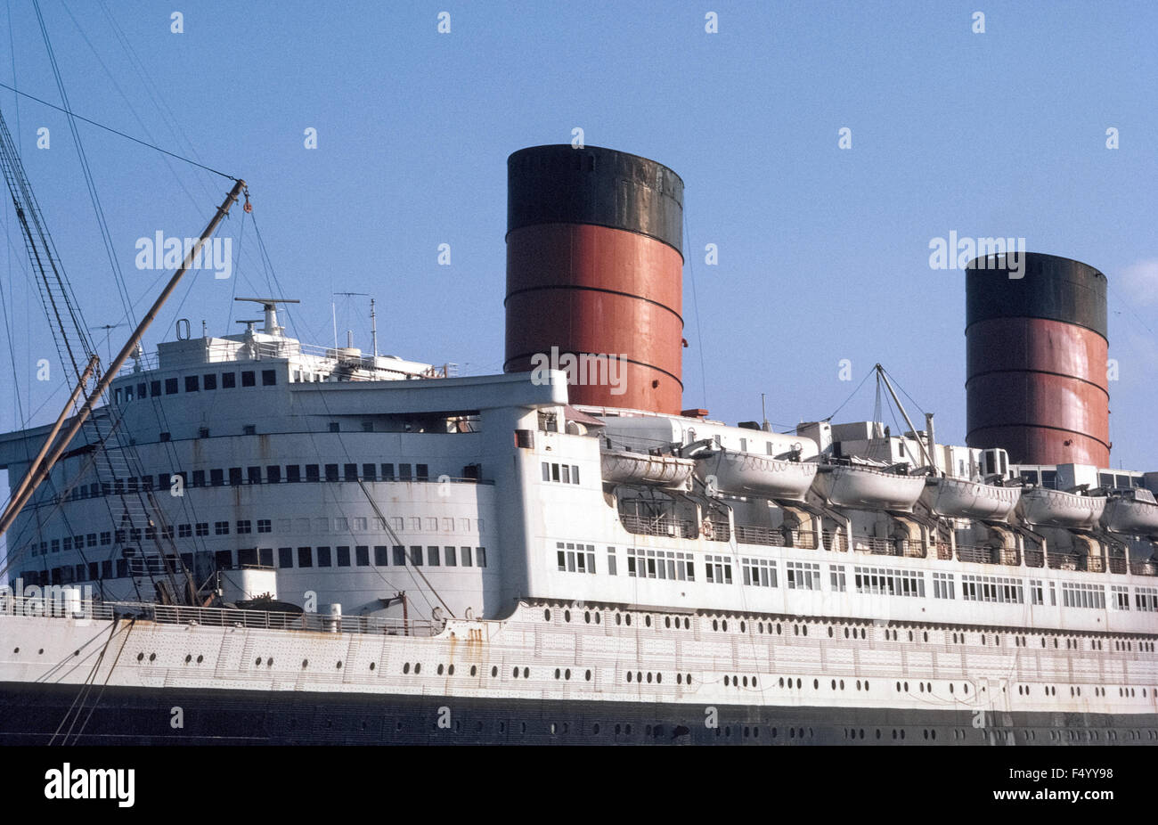 A pair of huge smoke stacks identify the RMS Queen Elizabeth, once the ...
