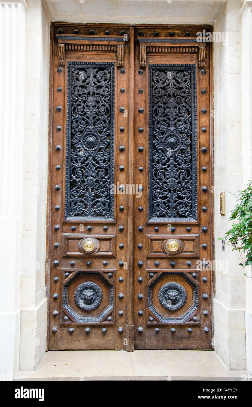 Beautiful, strong and old wood door in Paris Stock Photo - Alamy