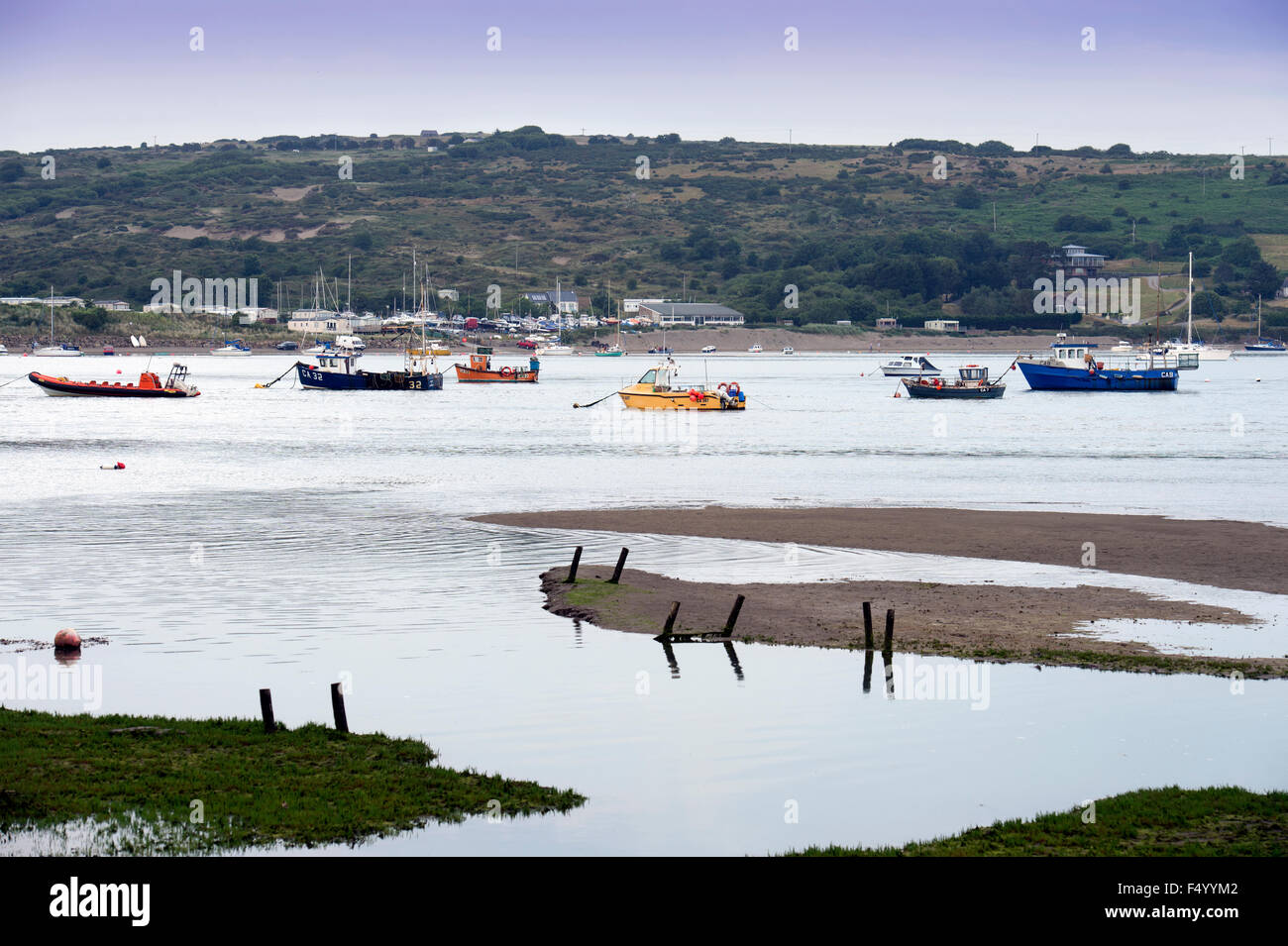 Fishing boats moored on the River Teifi estuary near St Dogmaels ...