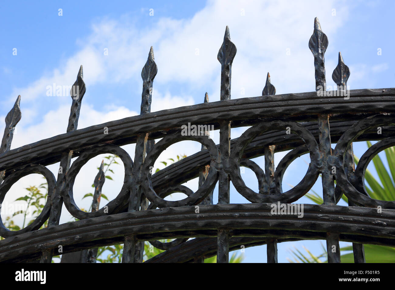 sturdy iron fence with sharp peaks Stock Photo - Alamy