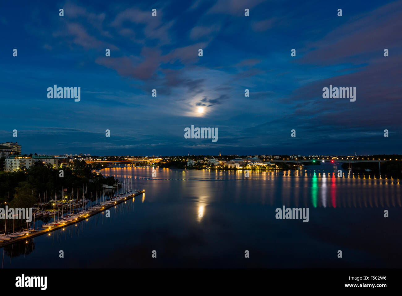 Moon Rising behind the clouds, Stockholm, Sweden Stock Photo - Alamy