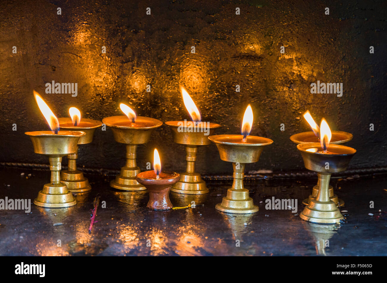 Butterlamps, lighted, as offerings at Swayambhunath Stupa, the Monkey ...