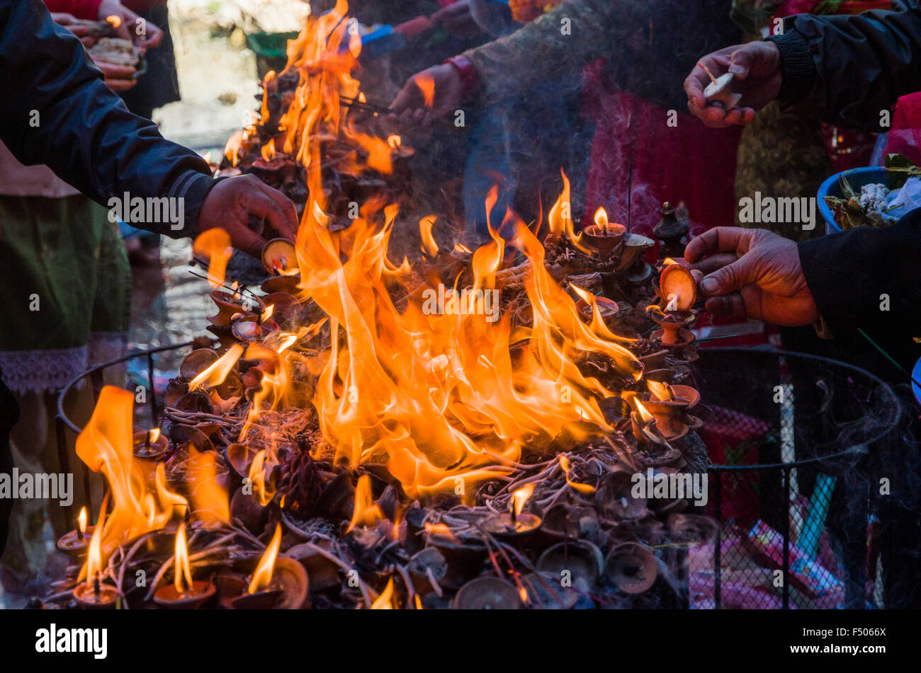 Fire created by many offered butterlamps at Dakshinkali Temple Stock ...