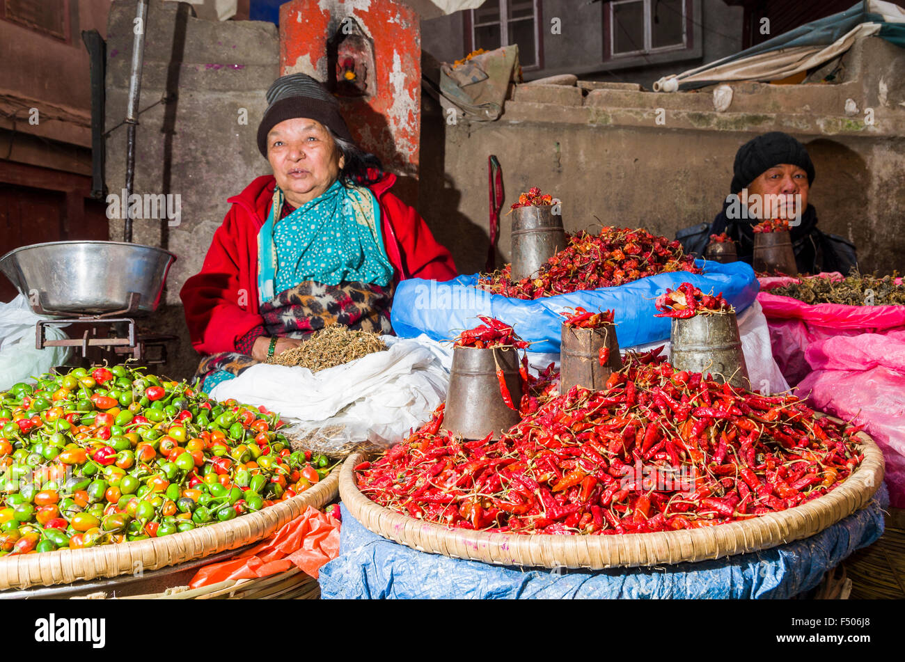 Different chillies sold on the street by a woman Stock Photo - Alamy