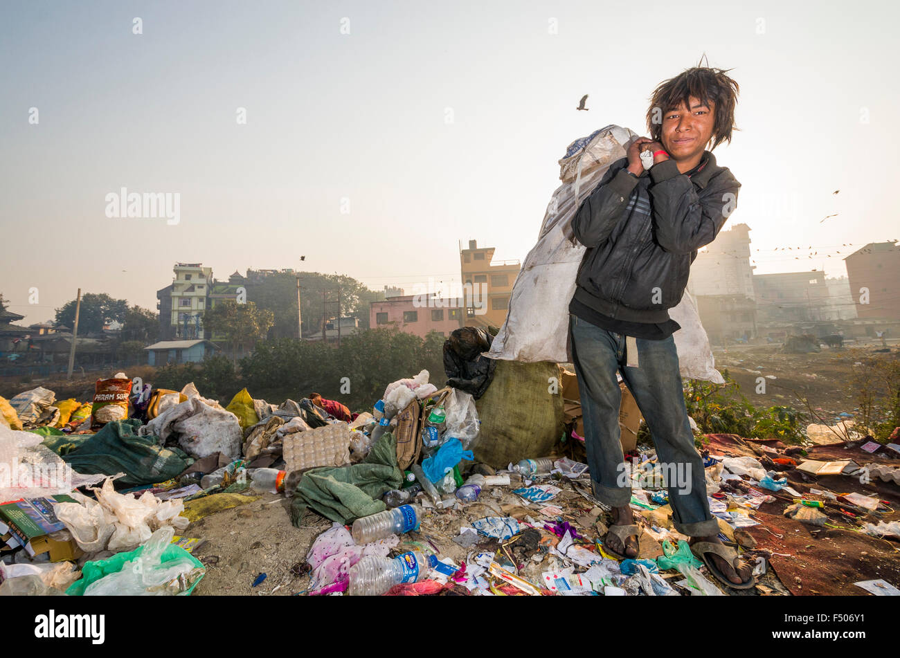 Children live, play and work on the garbage dump at Bhagmati River in ...