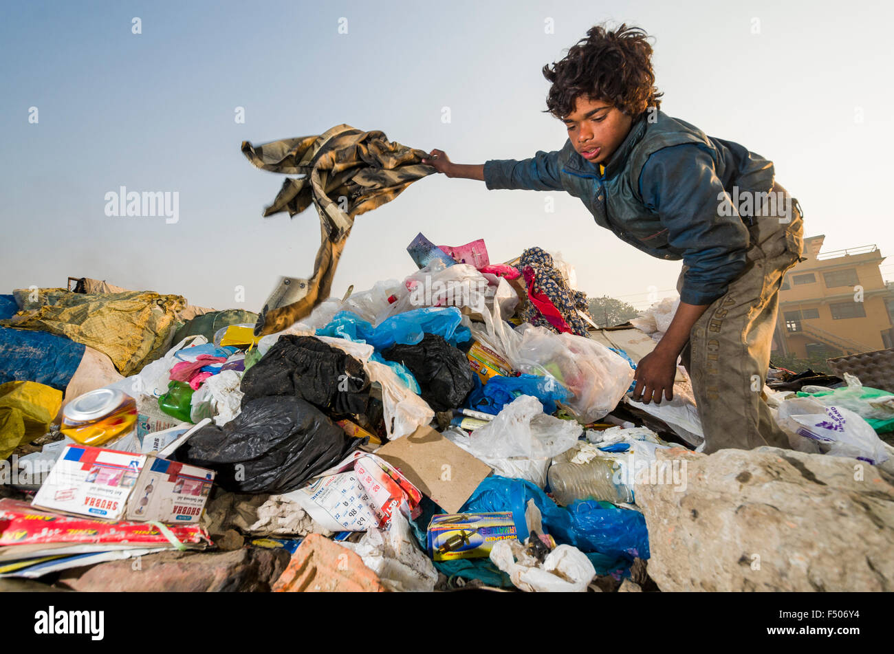 Children live, play and work on the garbage dump at Bhagmati River in ...