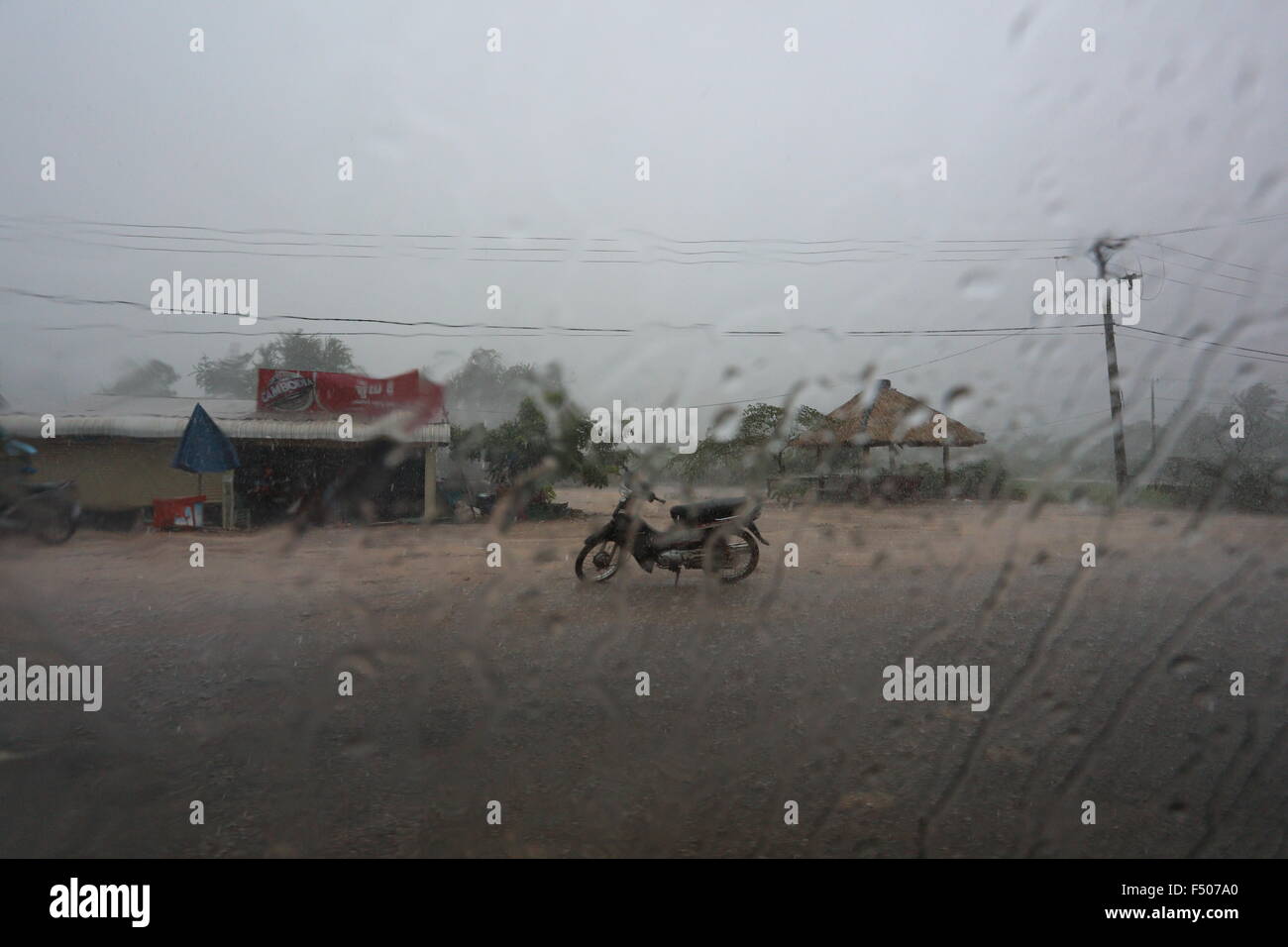 Monsoon as seen through a car window in cambodia Stock Photo - Alamy