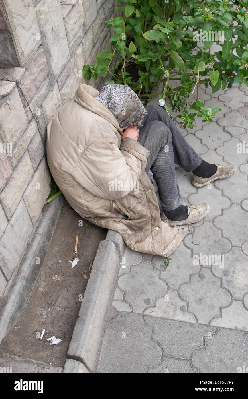 Homeless woman sleeping on the back streets of Tbilisi, Georgia Stock ...