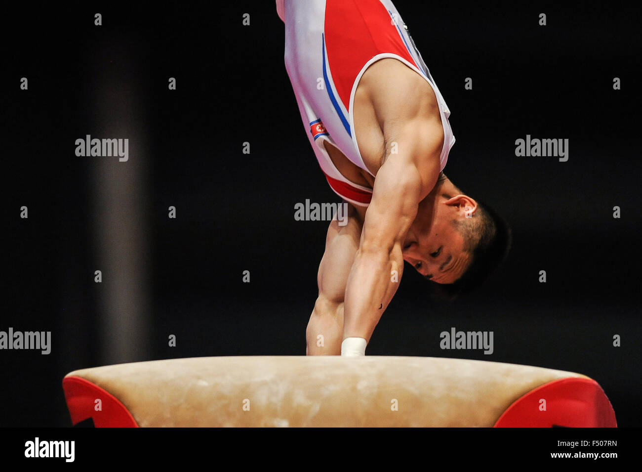 SE GWANG RI from North Korea competes on the vault during the ...