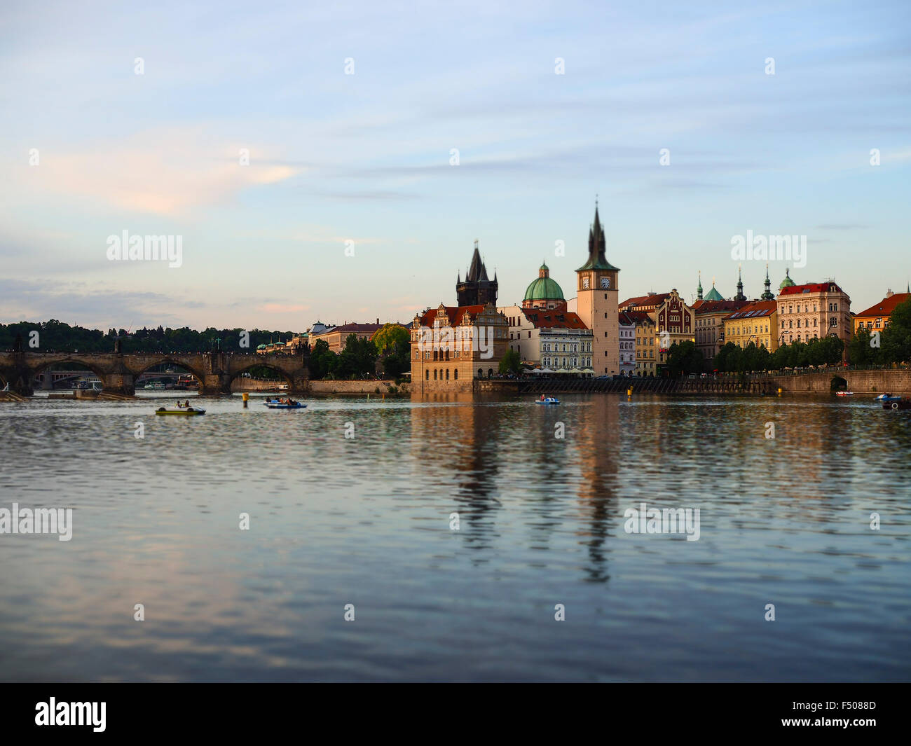 Prague, scenic view of Vltava river with Charles bridge in background ...
