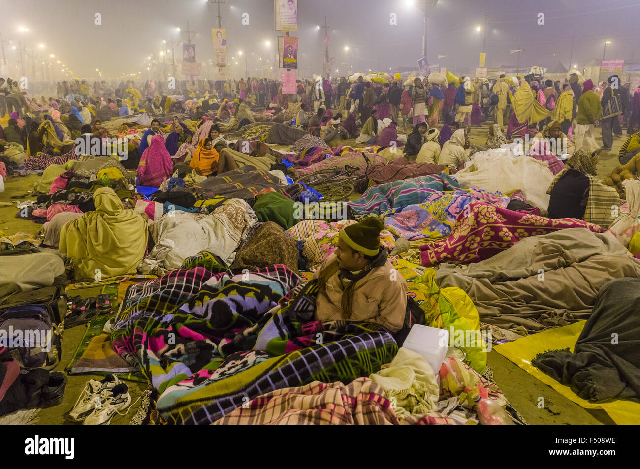 Millions of people gathering at Kumbha Mela ground, sitting and ...