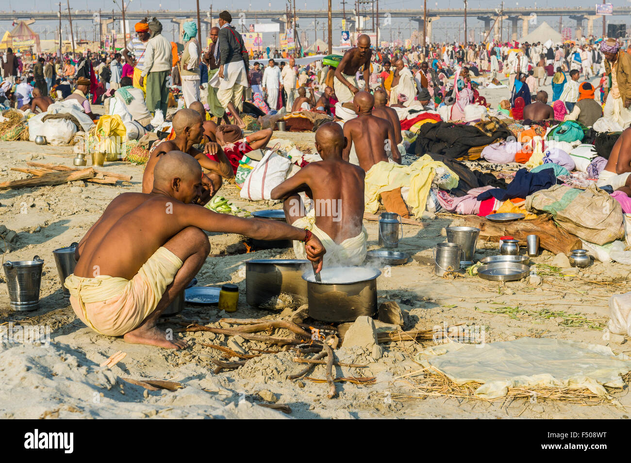 Millions of people gathering at Kumbha Mela ground, sitting and ...