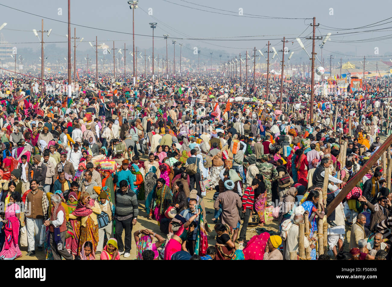 Millions of people gathering at Kumbha Mela ground, sitting and ...