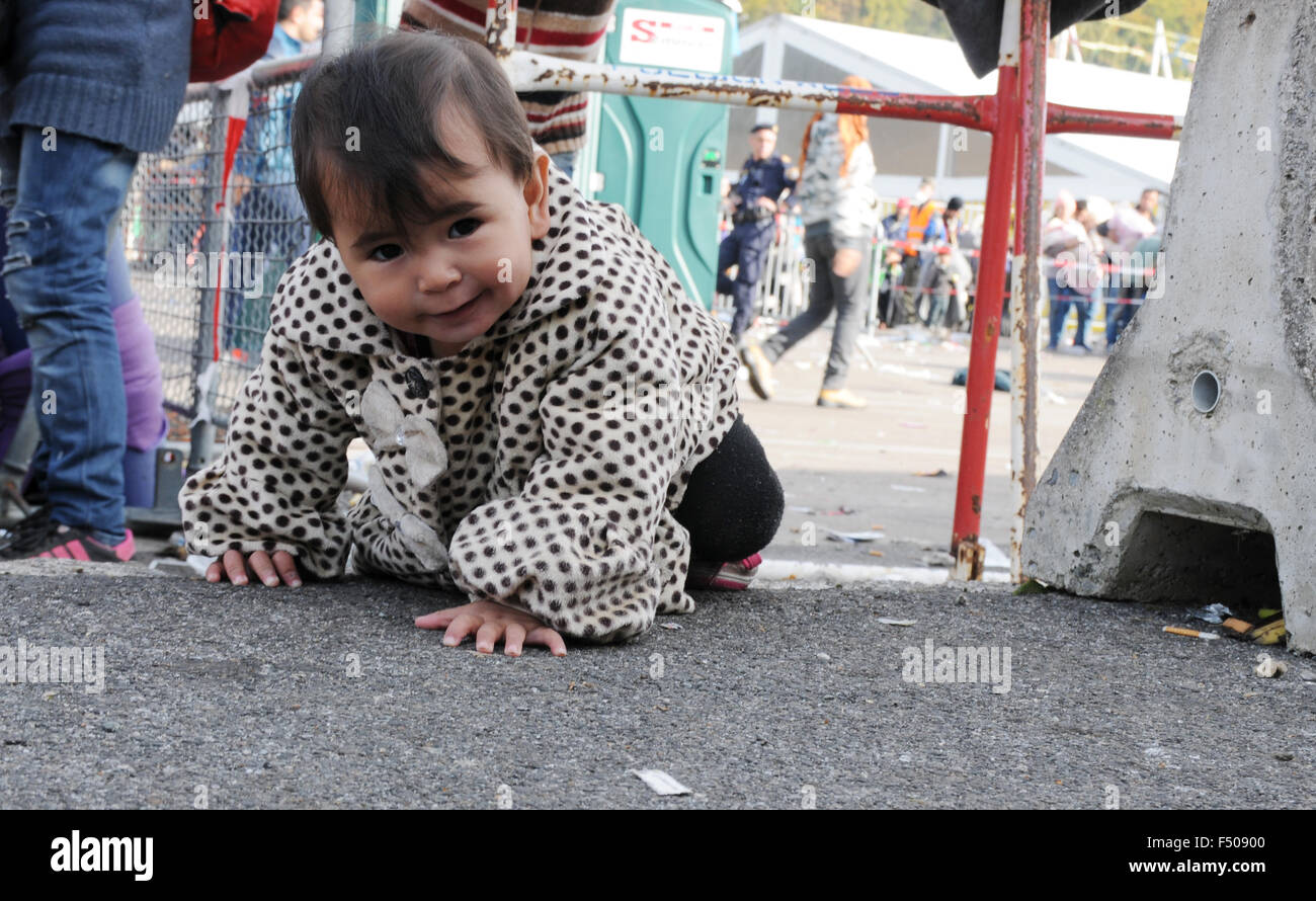 Spielfeld, Austria. 25th Oct, 2015. One-year-old Elia from Afghanistan ...