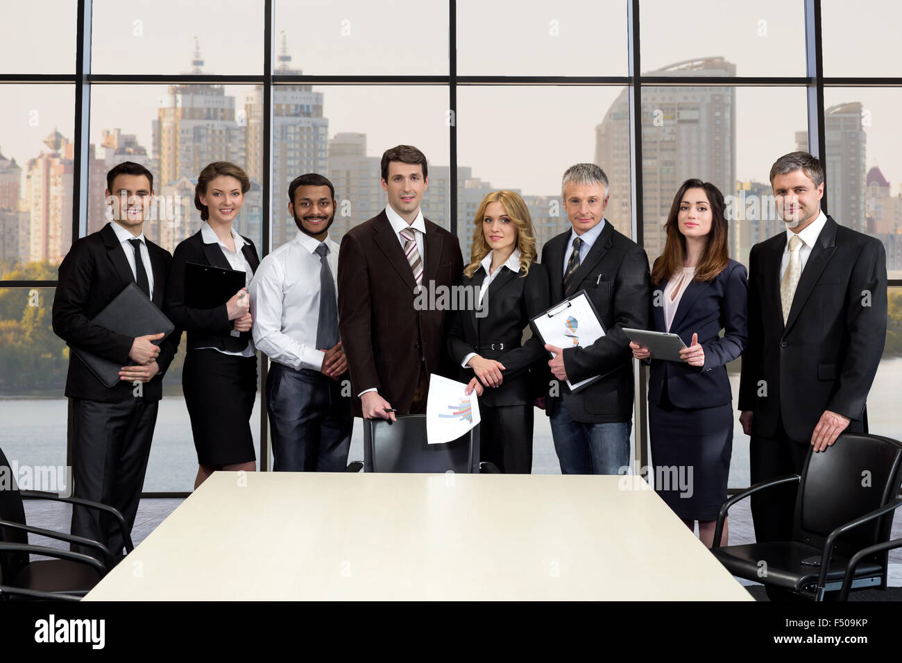 Team of businessmen in the business center. Business people on the ...