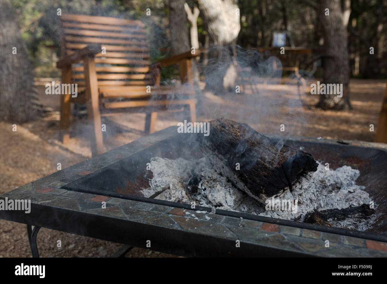 Smoldering fire hi-res stock photography and images - Alamy