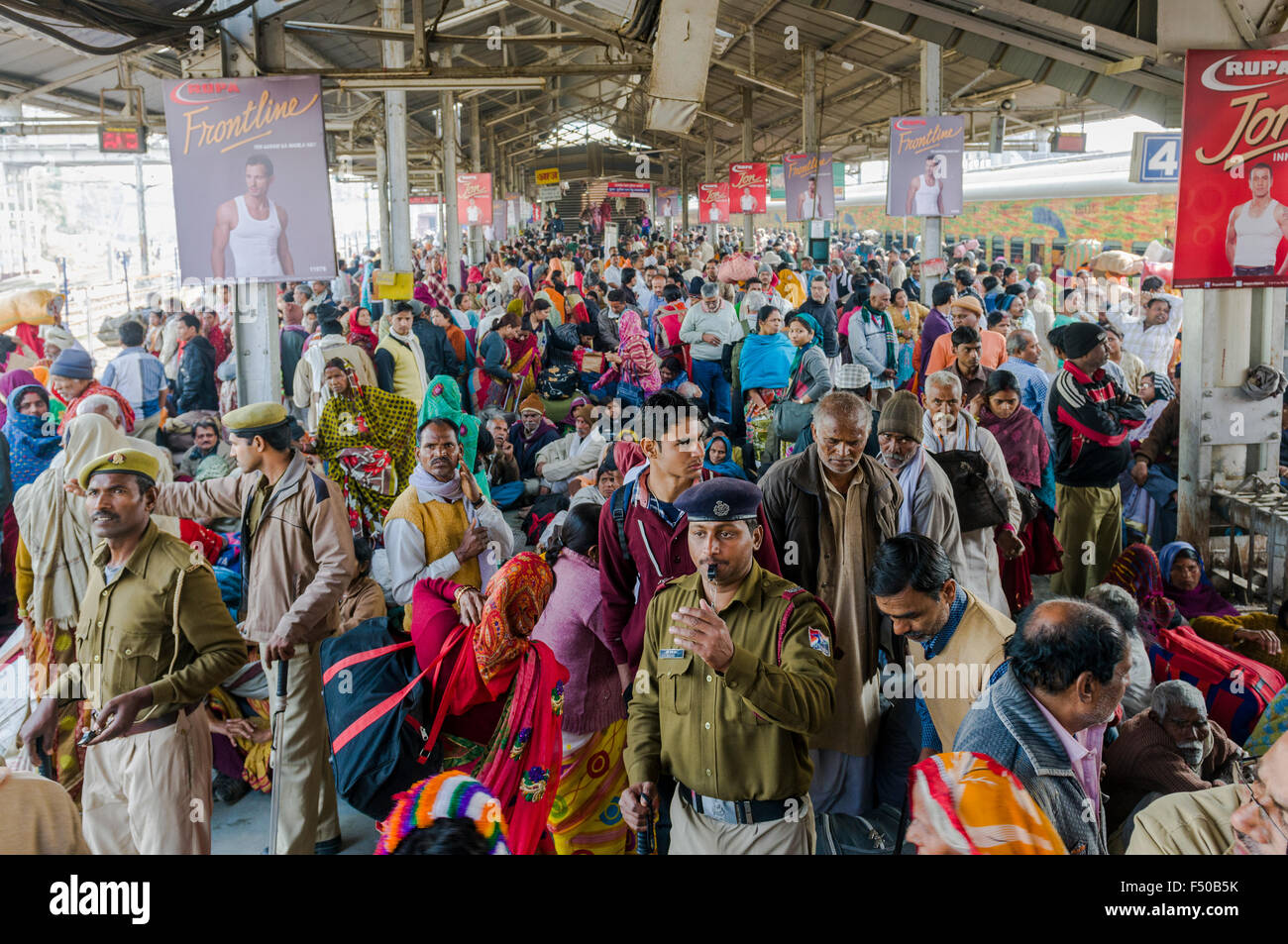 Many people waiting for delayed trains on a platform of the ...