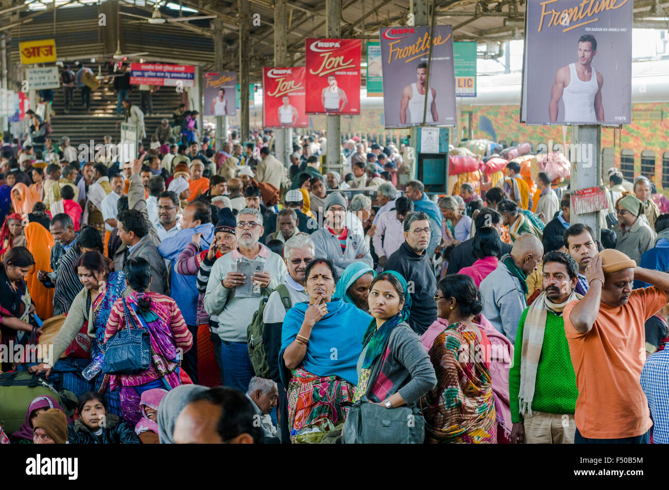 Many people waiting for delayed trains on a platform of the ...