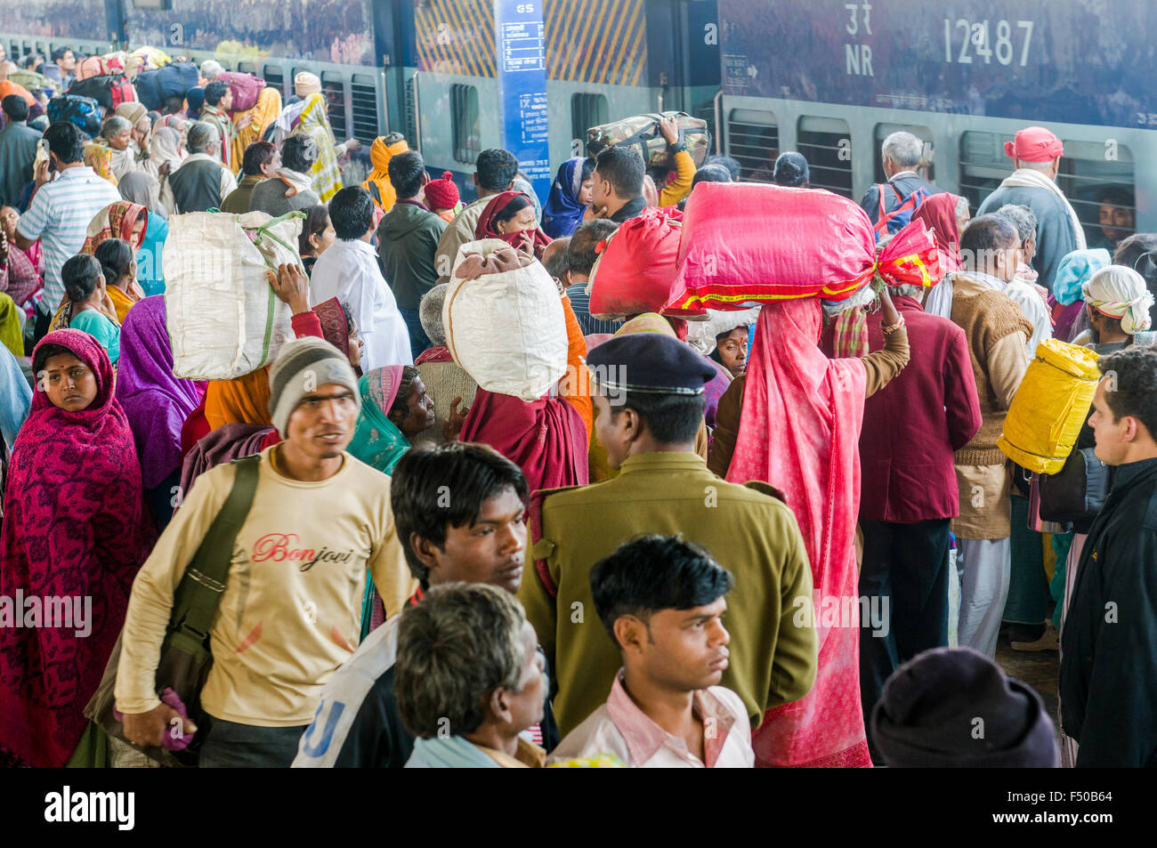 Many people waiting for delayed trains on a platform of the ...