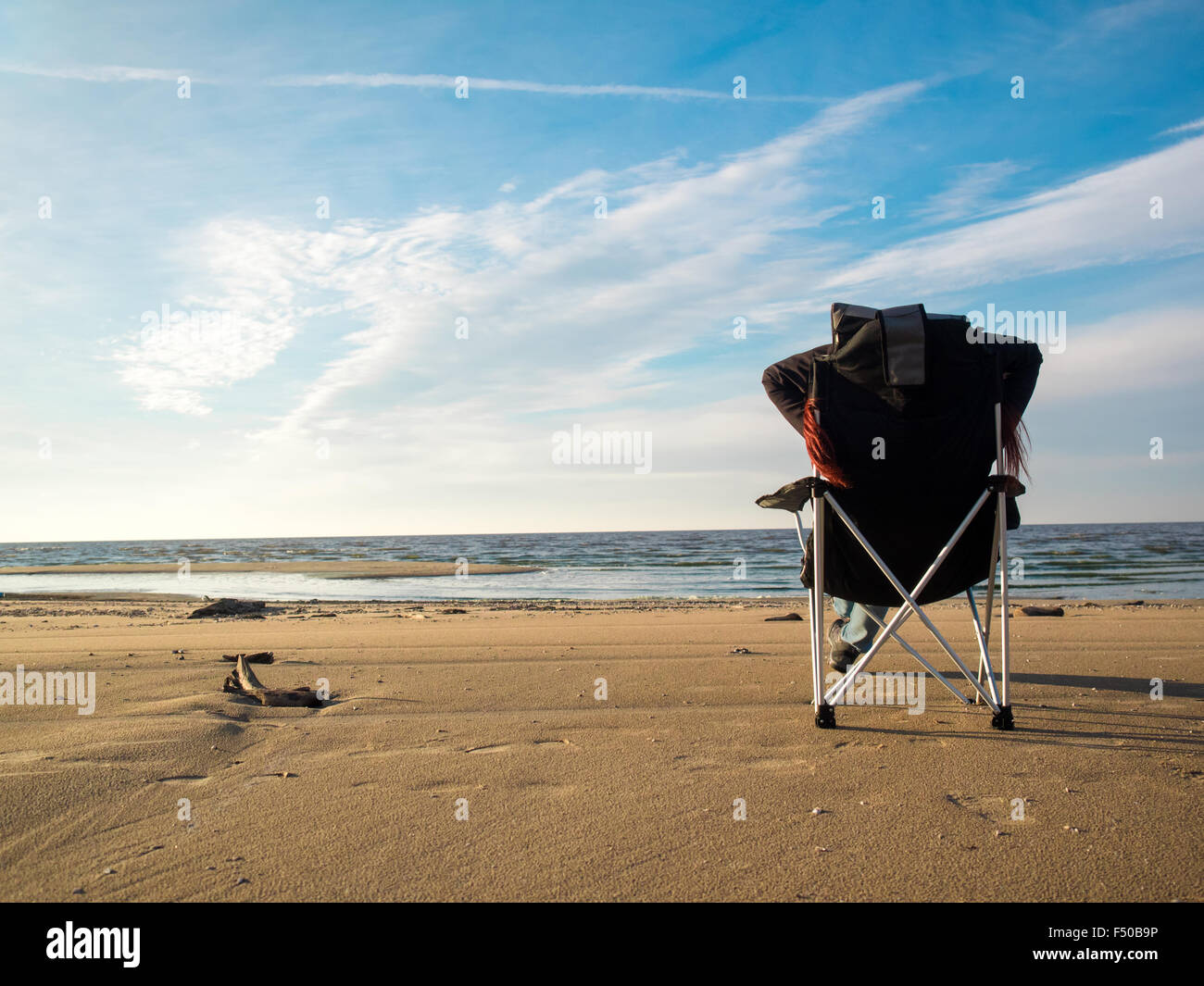 woman resting on beach Stock Photo - Alamy