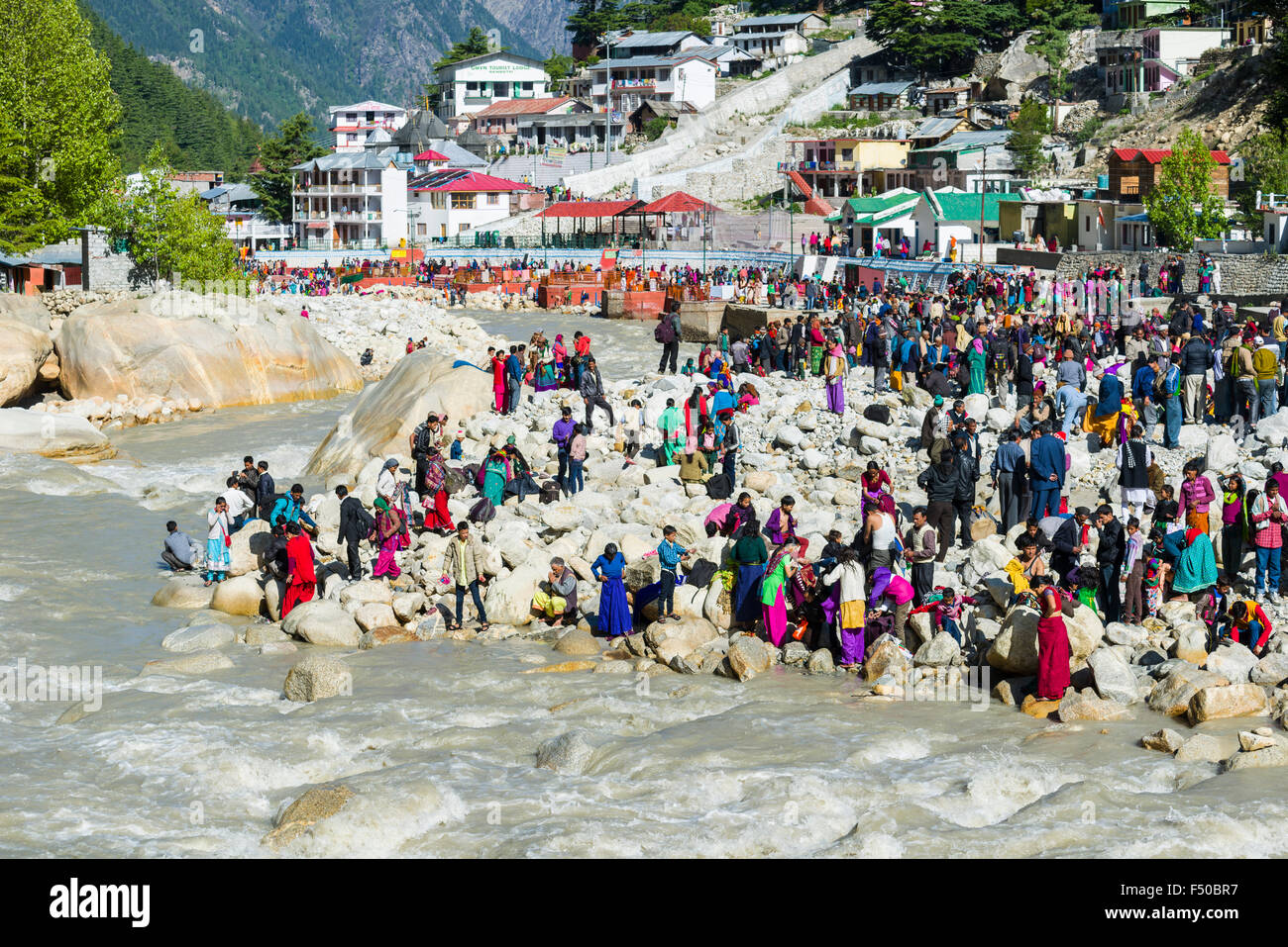 Pilgrims from all over India come to the banks of the river Ganges to ...